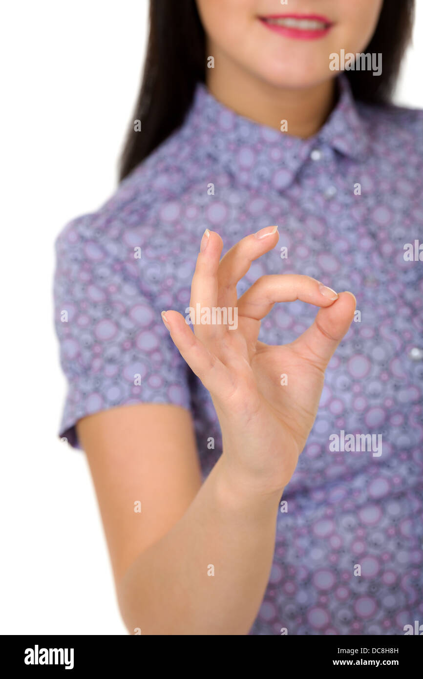 smiling girl showing OK sign isolated on white background Stock Photo ...