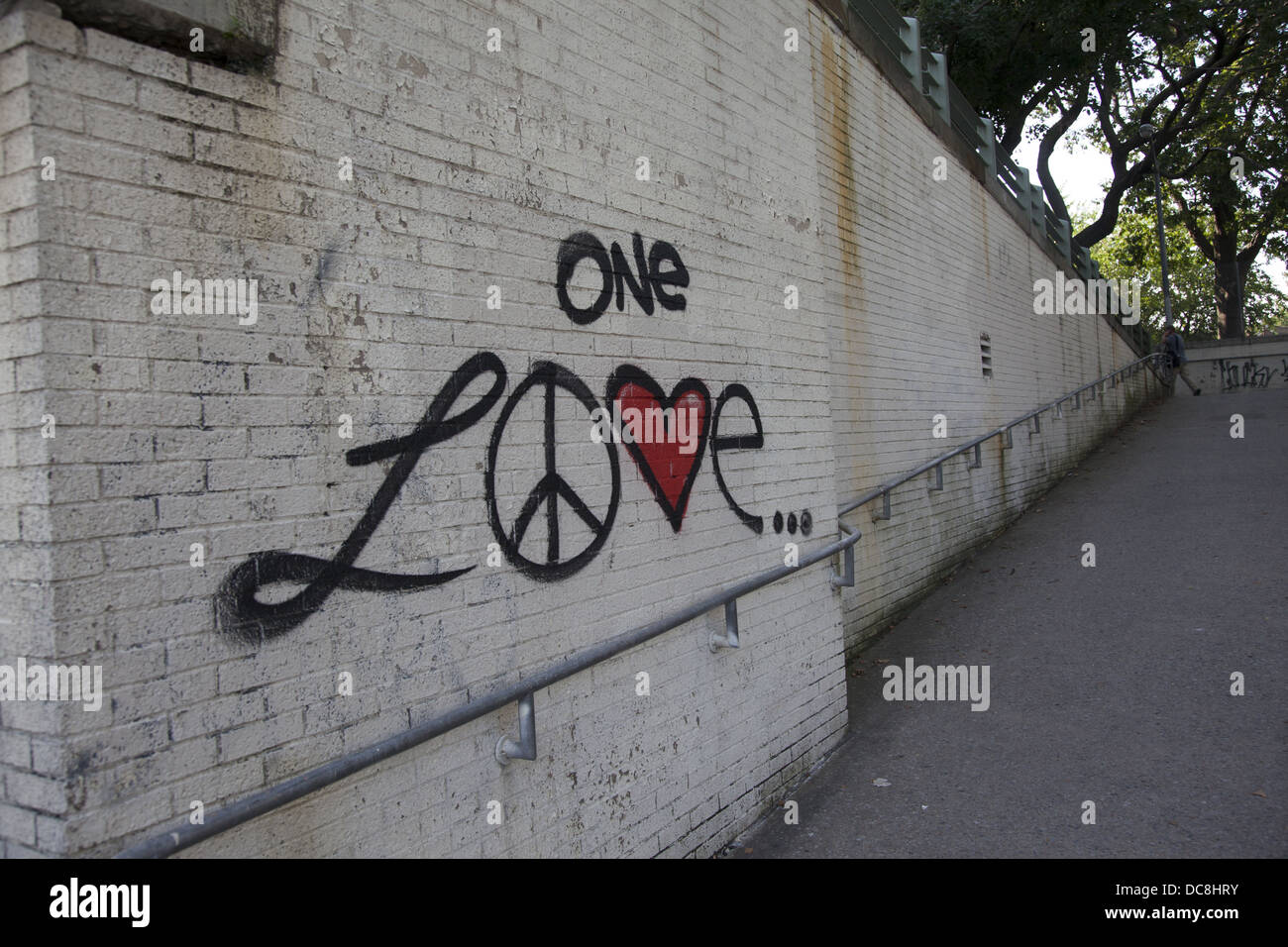 Sidewalk ramp onto pedestrian bridge in a residential neighborhood in ...