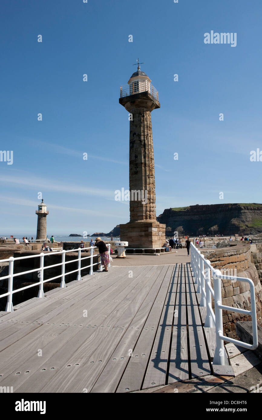 Whitby bay pier and lighthouses Stock Photo - Alamy