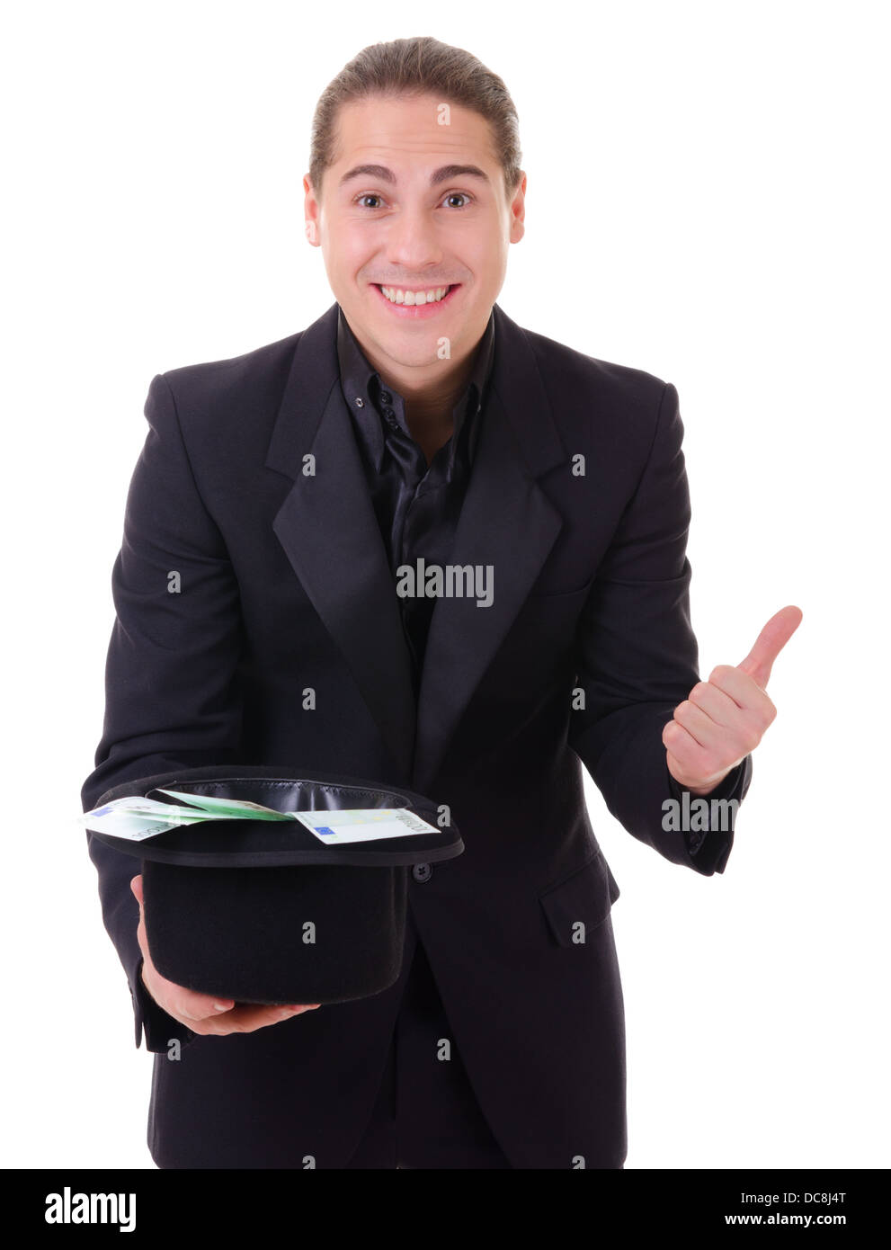 Male magician in black suit hi-res stock photography and images - Alamy