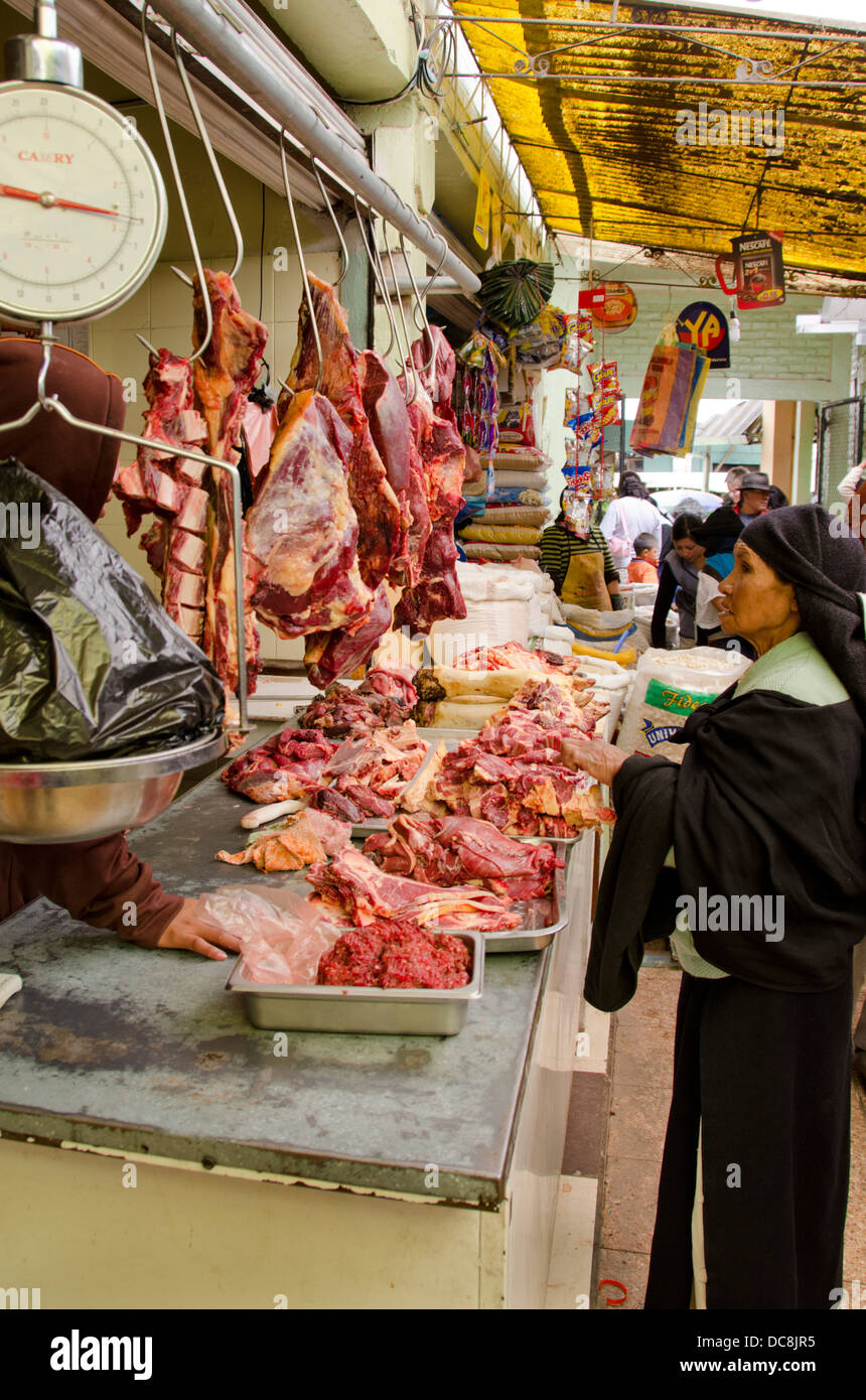 Ecuador, Quito highlands, Otavalo. Otavalo Market, meat vendor Stock ...