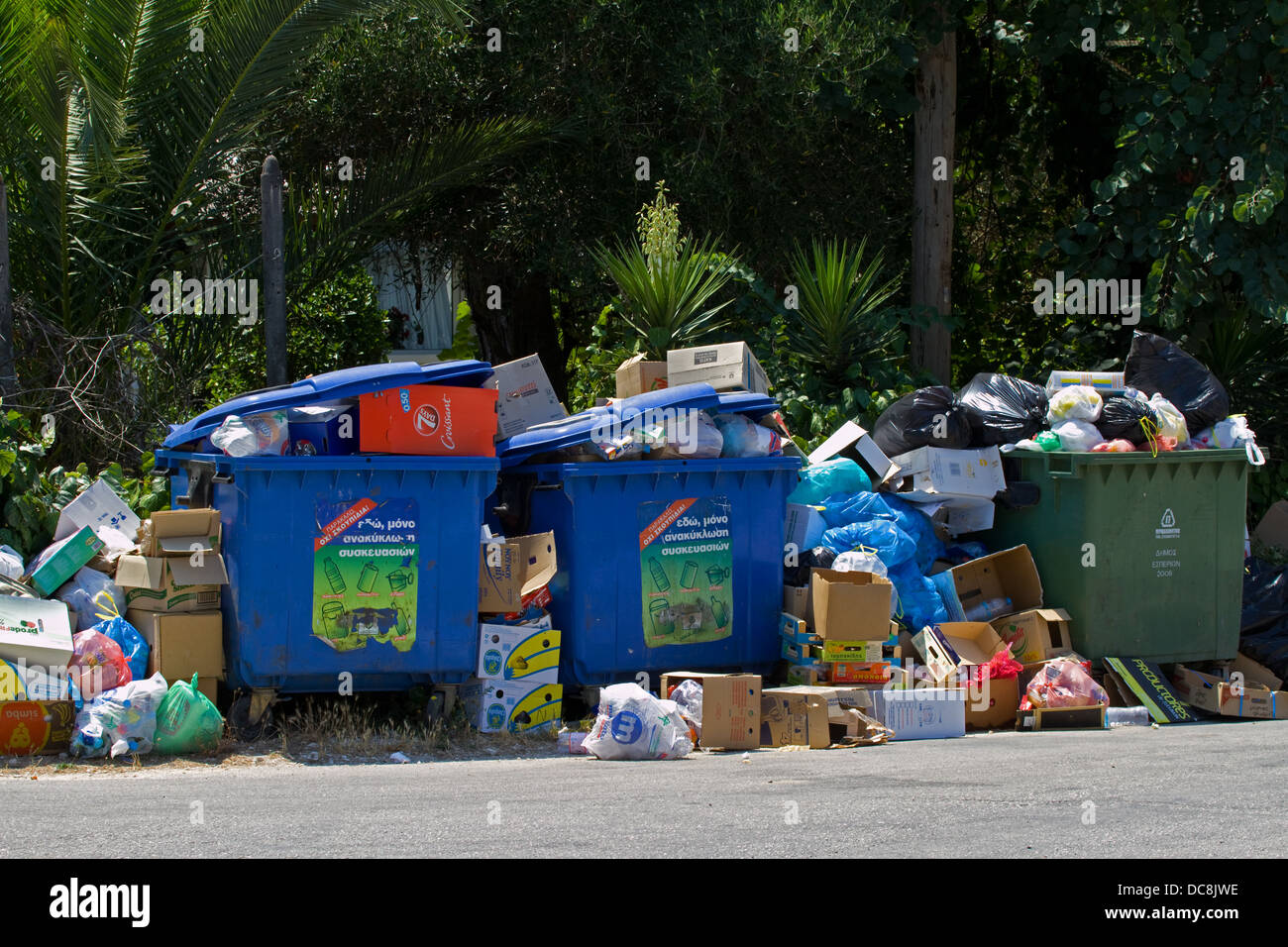 Rubbish on roadside awaiting collection. Corfu. Greece Stock Photo - Alamy