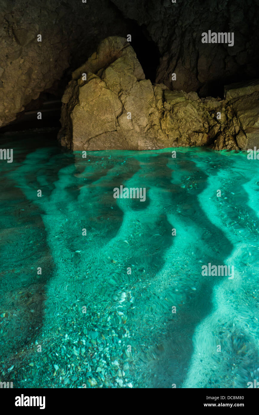 Inside a small cave at the beautiful Tsigrado beach on the Greek island ...