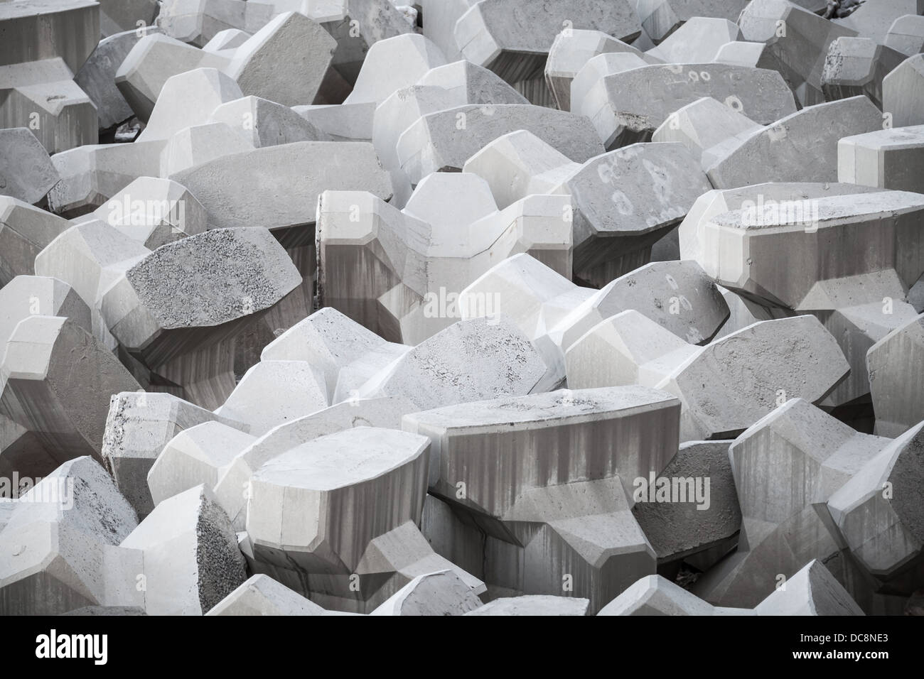 Gray coastal fortification blocks made of concrete. Photo background ...