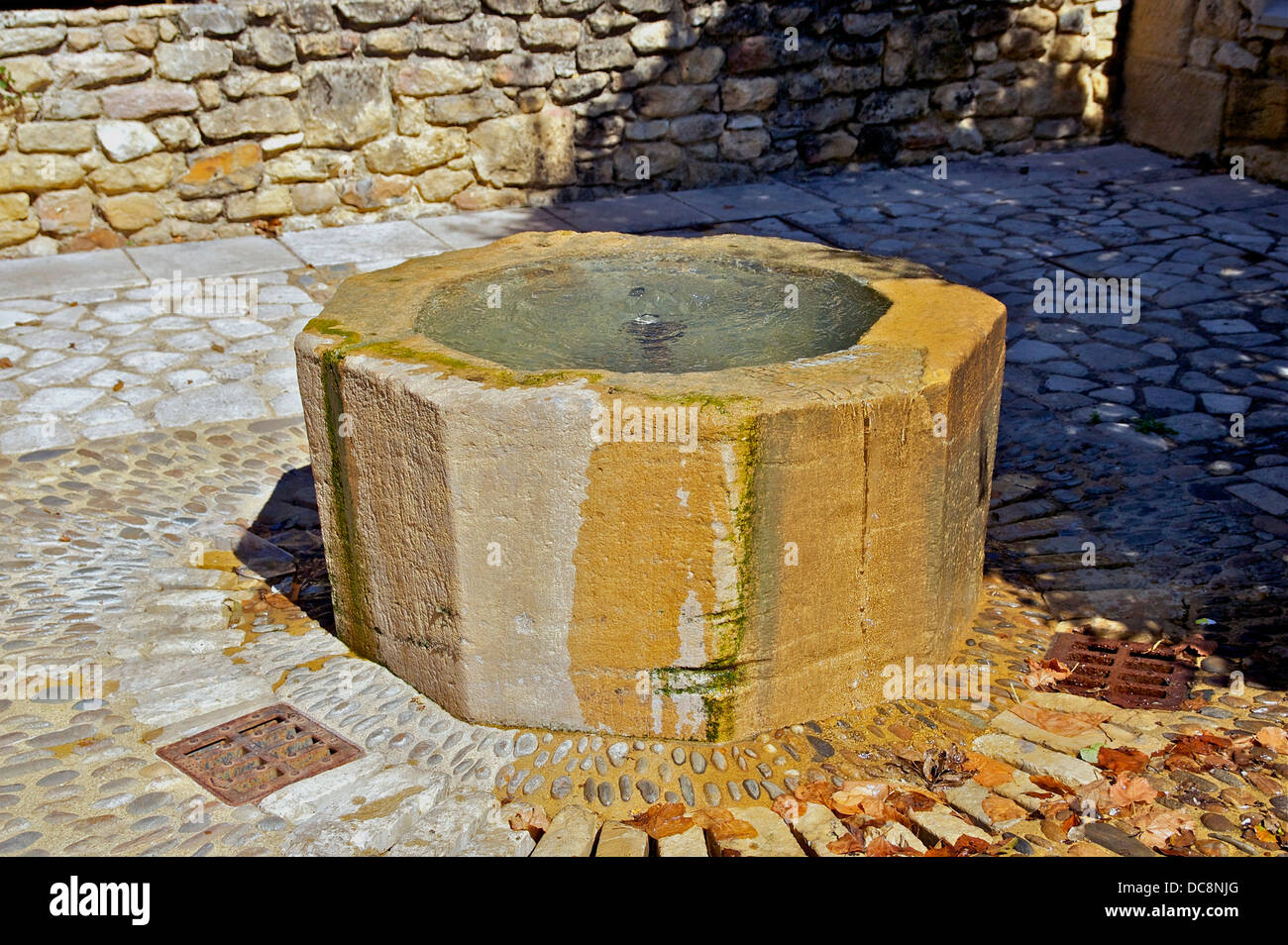 a public fountain in Plazac, Dordogne, France Stock Photo - Alamy