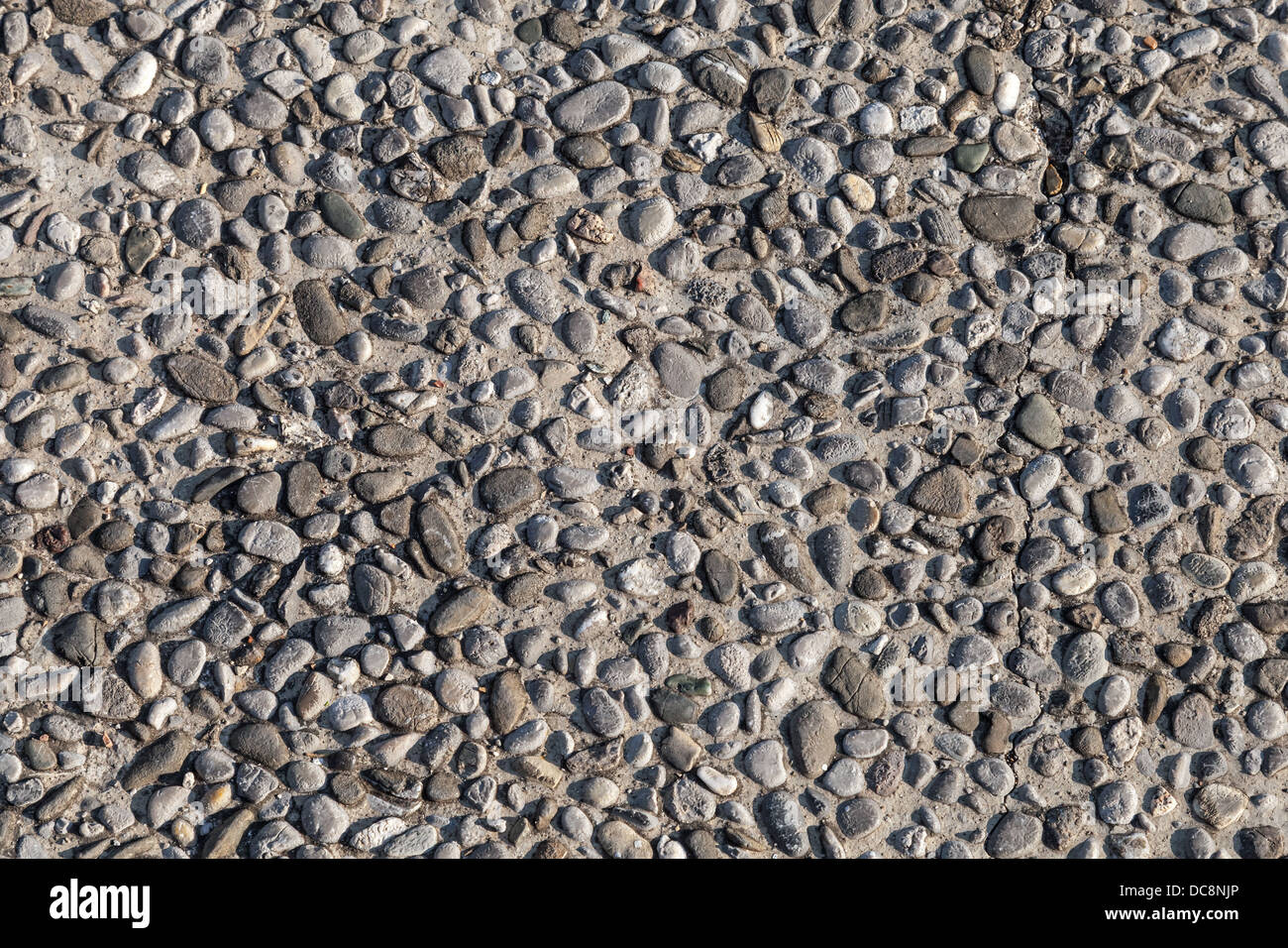 Small stone ancient pavement background texture Stock Photo - Alamy
