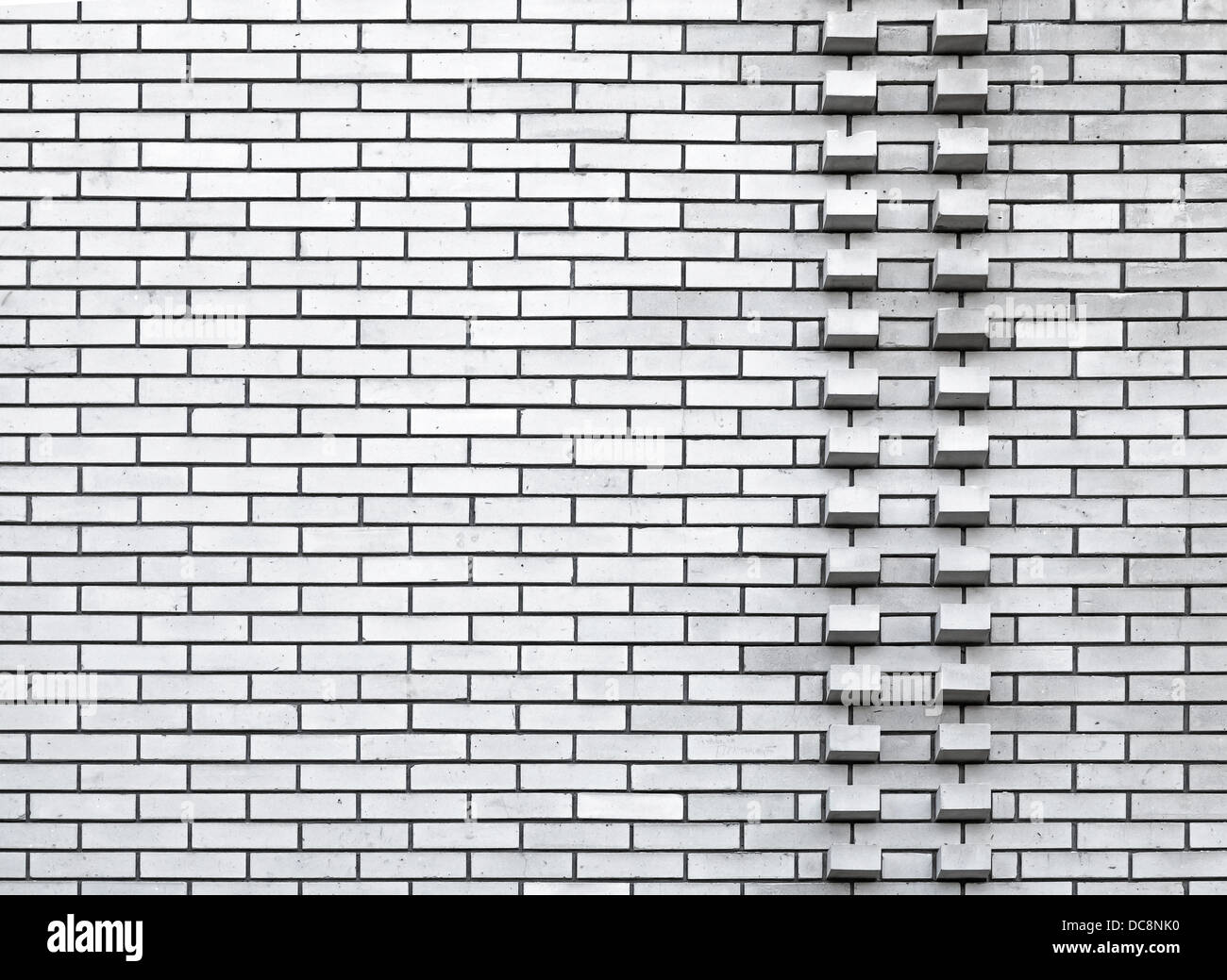 White wall background texture with two rows of protrusive bricks Stock ...