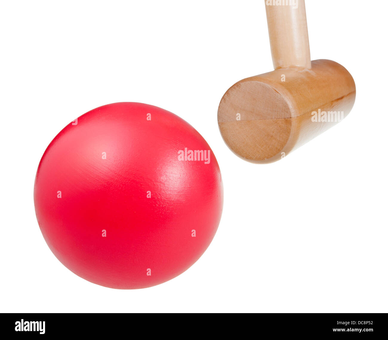 croquet wooden mallet hits red ball close up isolated on white ...