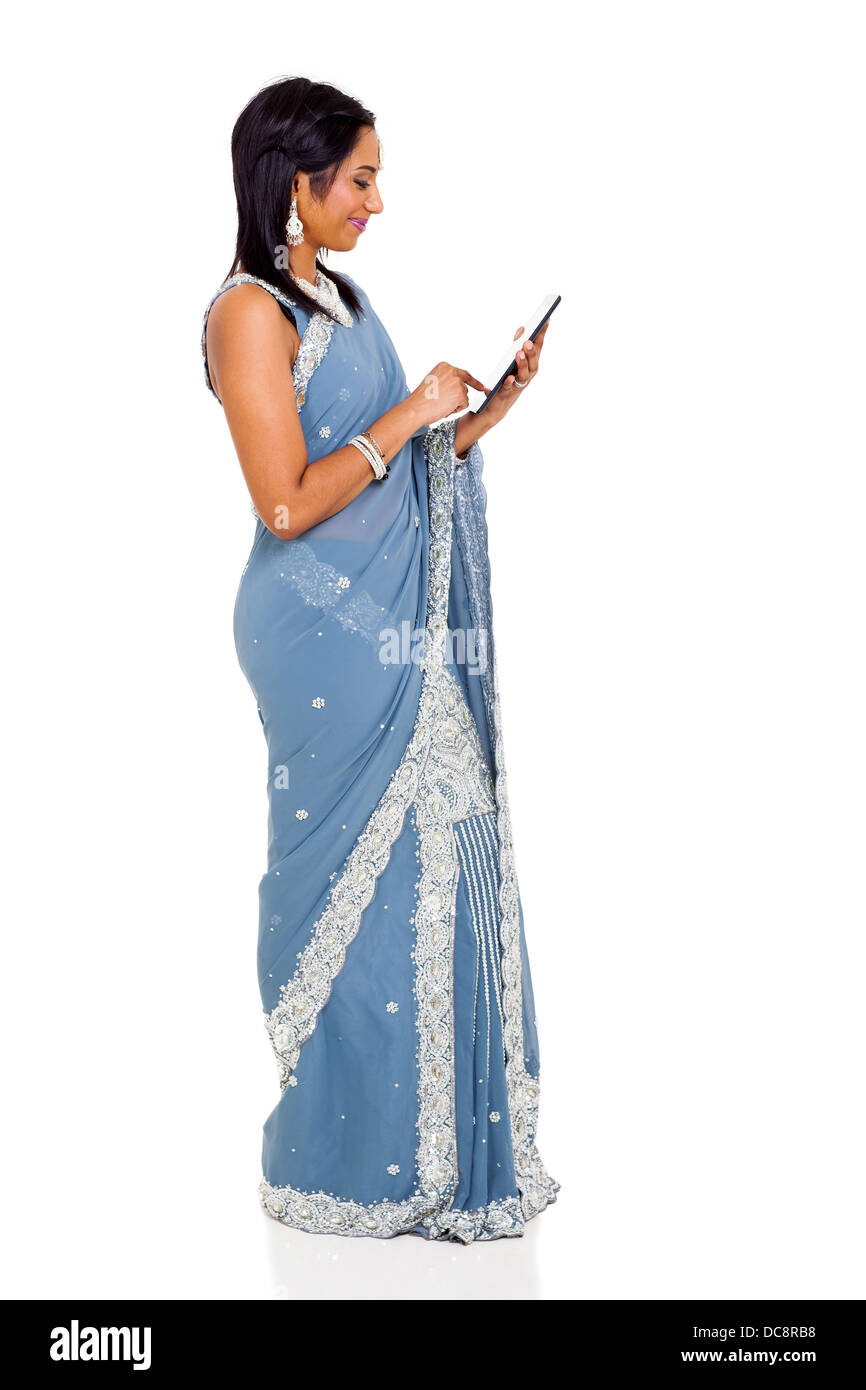 traditional Indian woman in sari using tablet computer Stock Photo - Alamy