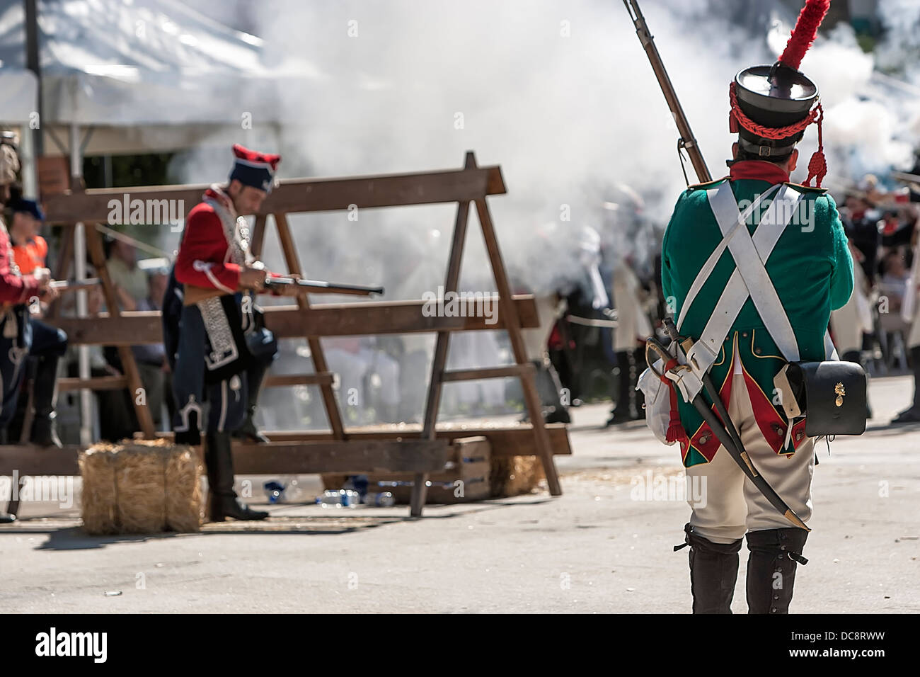 French soldiers firing from a barricade during the Representation of ...