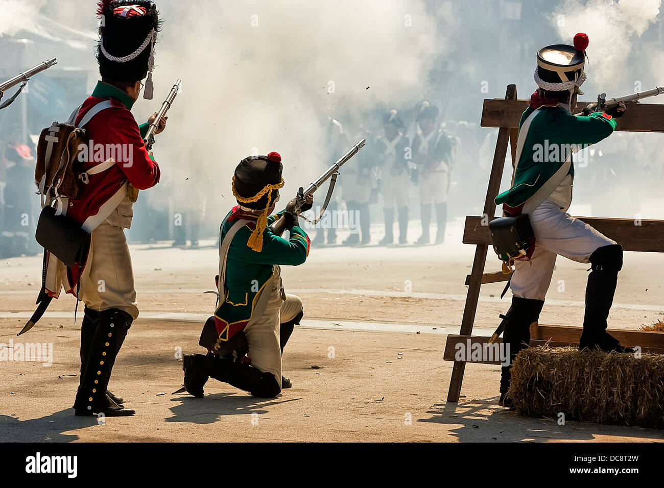 French soldiers firing from a barricade during the Representation of ...
