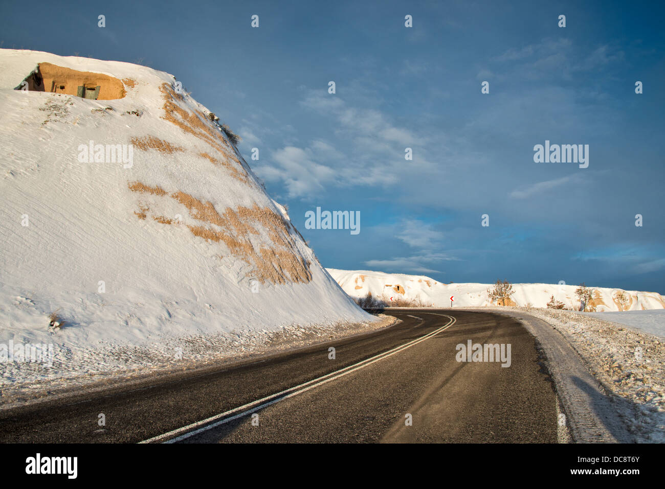 Snowy mountain road Stock Photo - Alamy