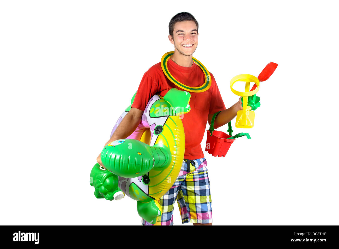 Teenager with funny beach gear for kids Stock Photo - Alamy