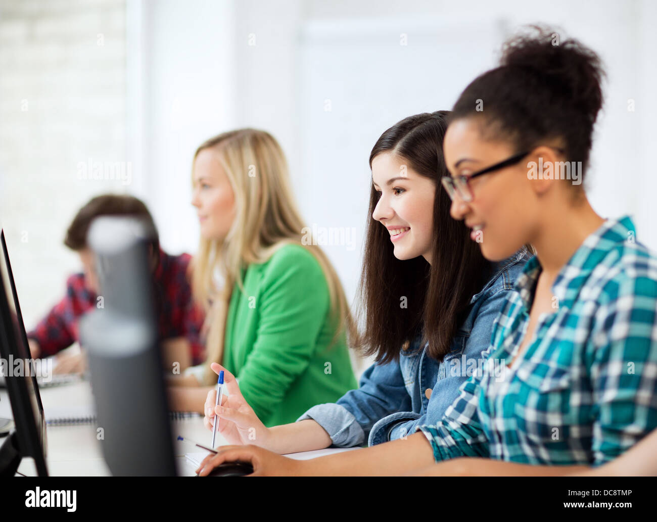 students with computers studying at school Stock Photo - Alamy