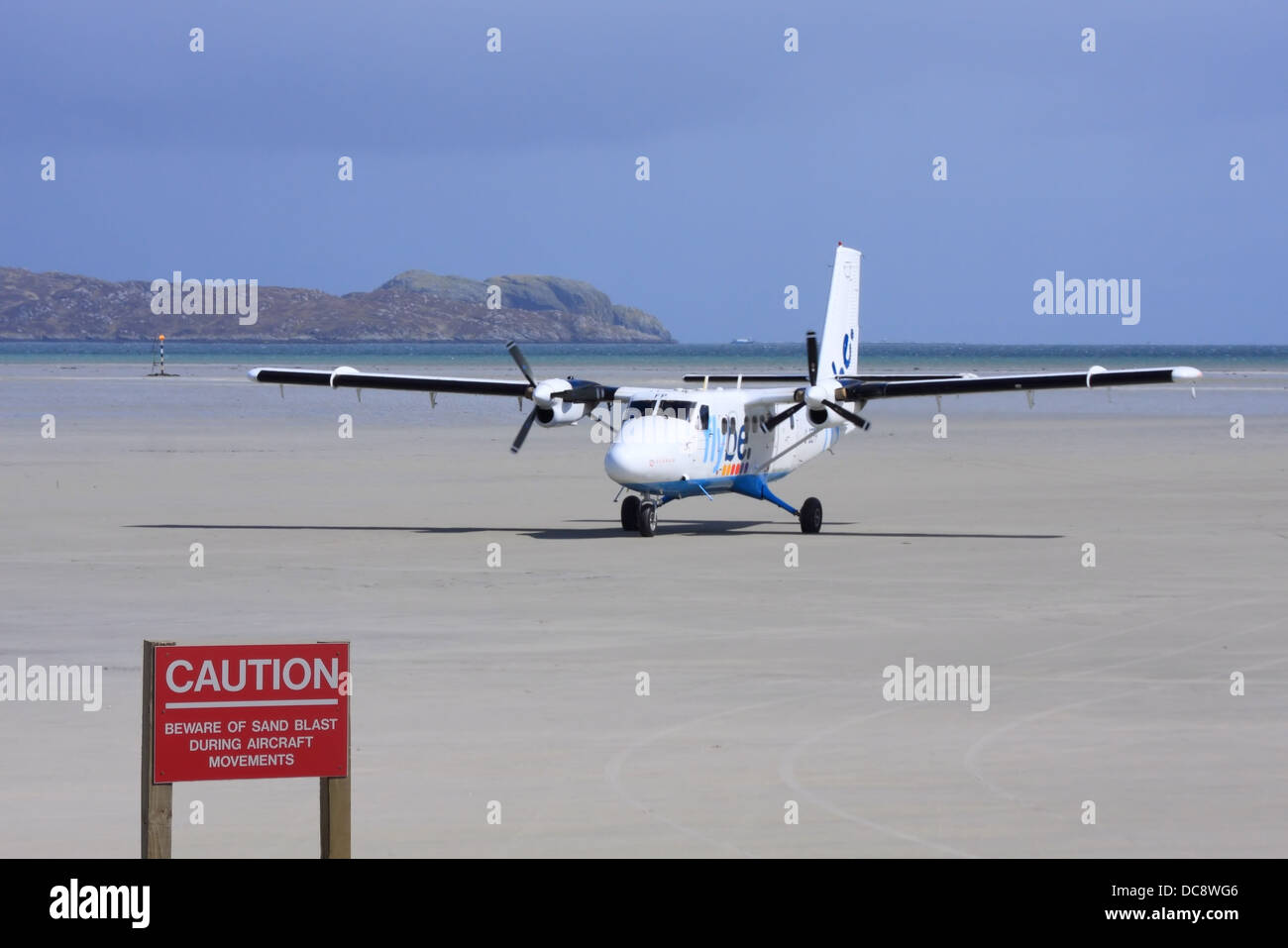 Plane on the beach at Barra Airport in the Outer Hebrides, Scotland ...