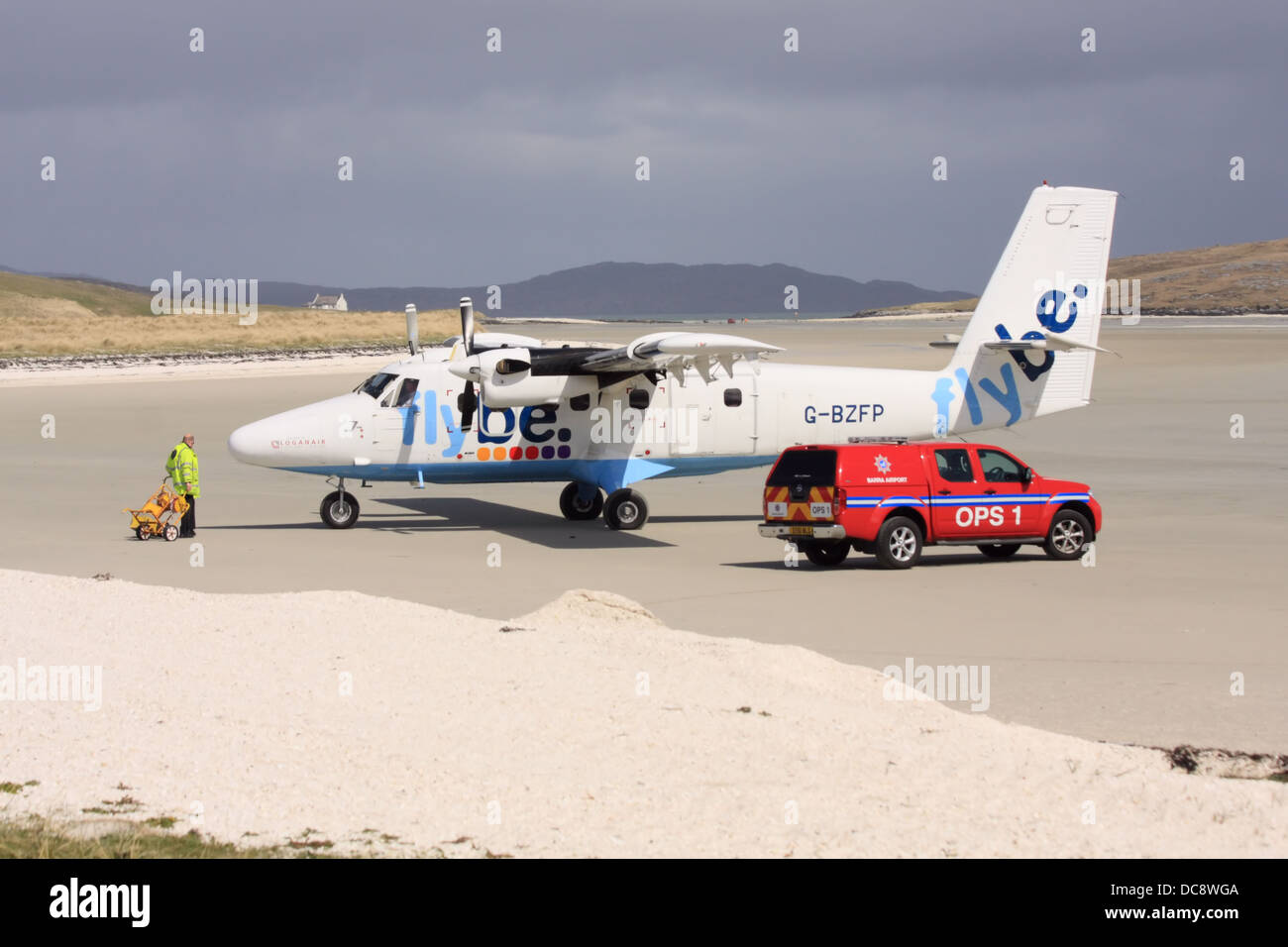 Plane on the beach at Barra Airport in the Outer Hebrides, Scotland ...
