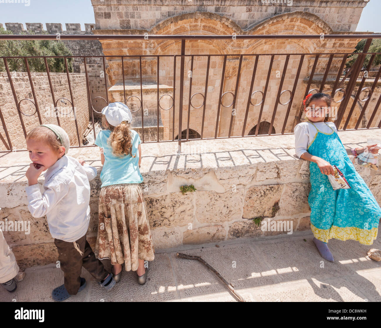 Jerusalem, Israel. Jewish children on tour of the temple mount look at ...