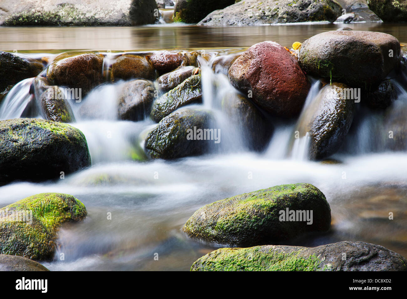 Water spilling over rocks hi-res stock photography and images - Alamy