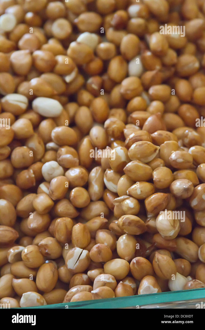 Fresh, raw, organic peanuts ready for roasting Stock Photo - Alamy