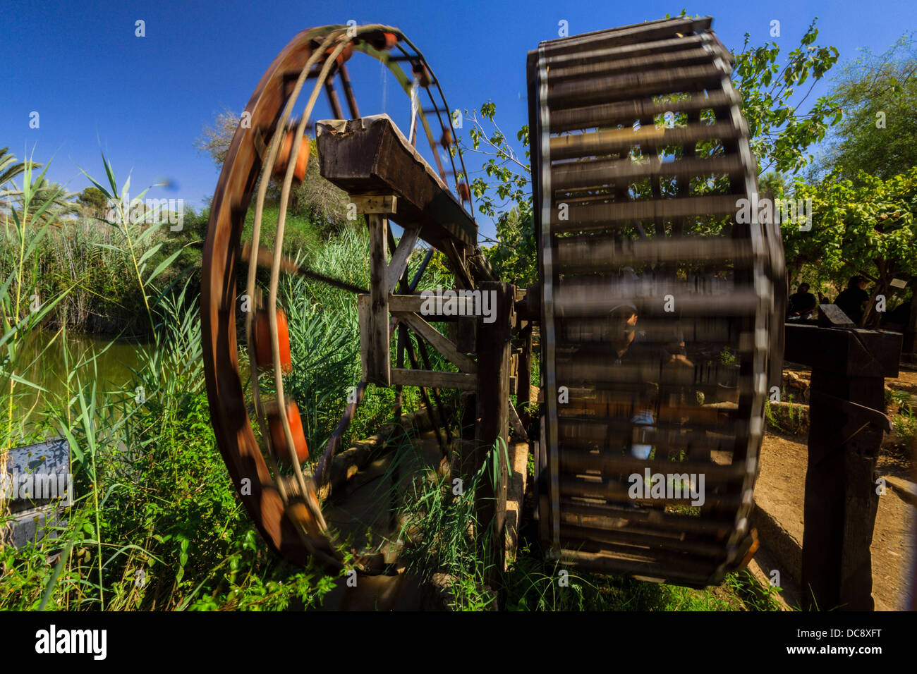 Ne'ot Kedumim, Israel. A wooden man-powered water wheel turning ...