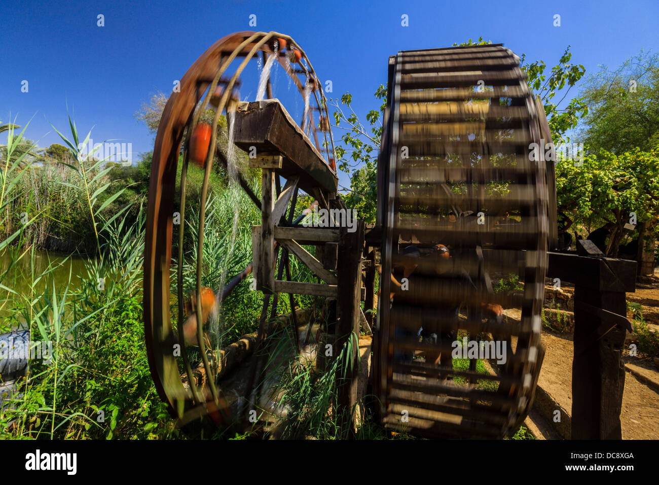 Ne'ot Kedumim, Israel. A wooden man-powered water wheel turning ...