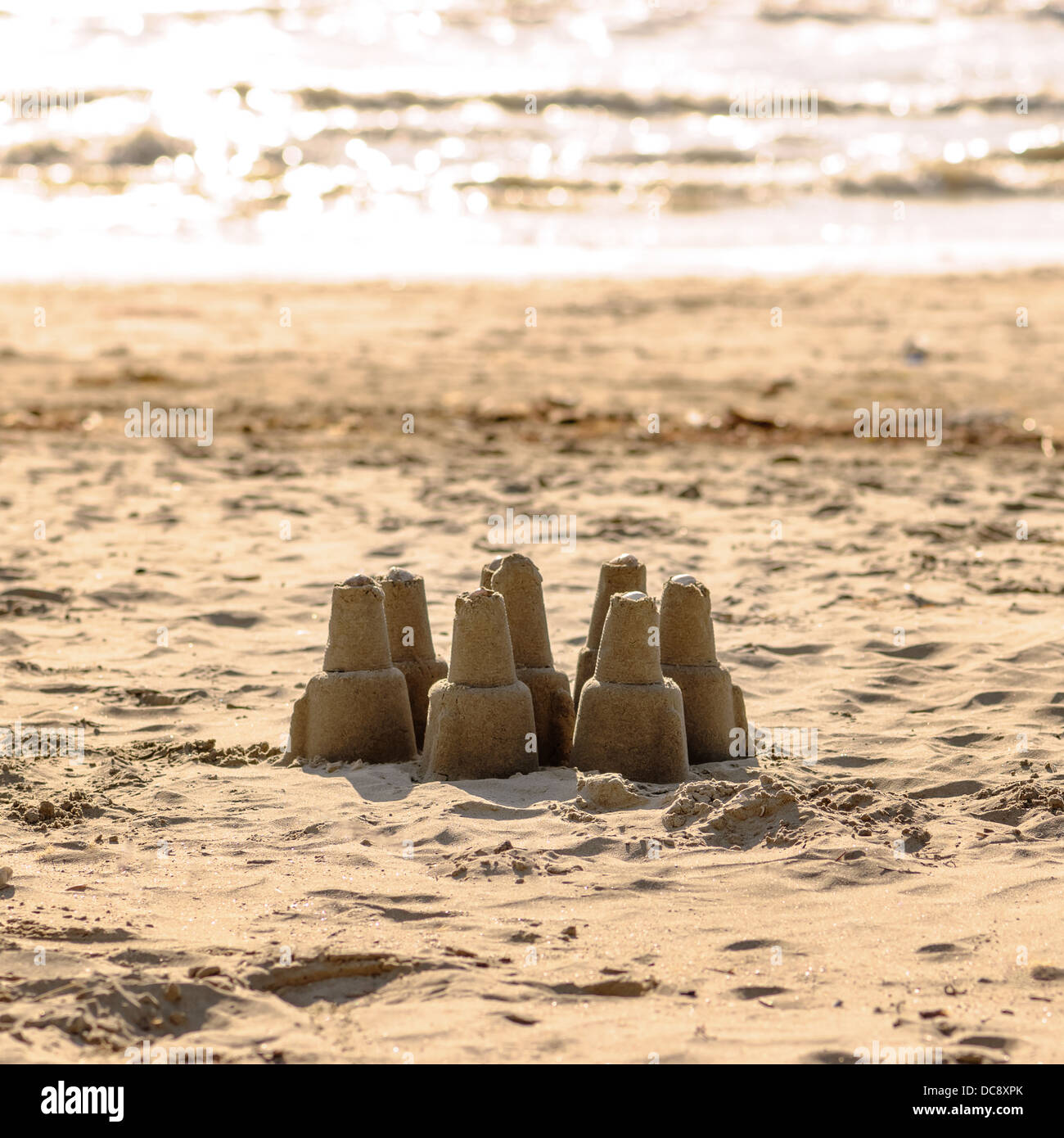 Sand castle leisure activity at the beach Stock Photo - Alamy
