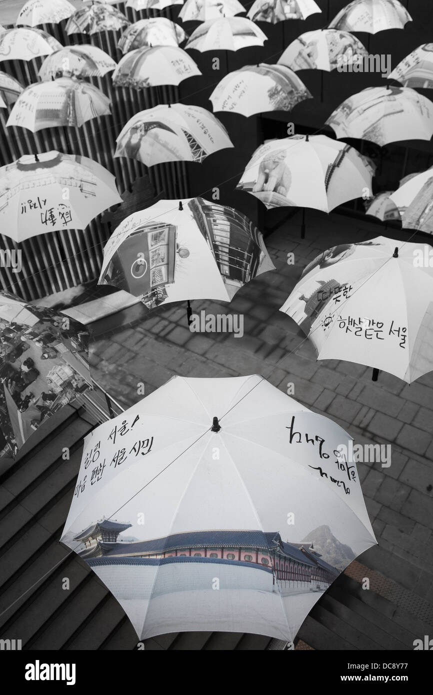 An art installation near the City Hall with many umbrellas dangling ...