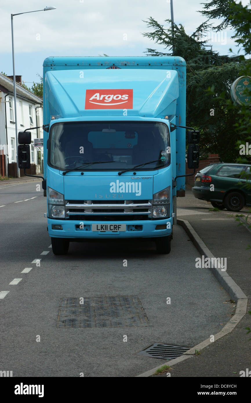 argos truck packed unloading street small shop Stock Photo - Alamy