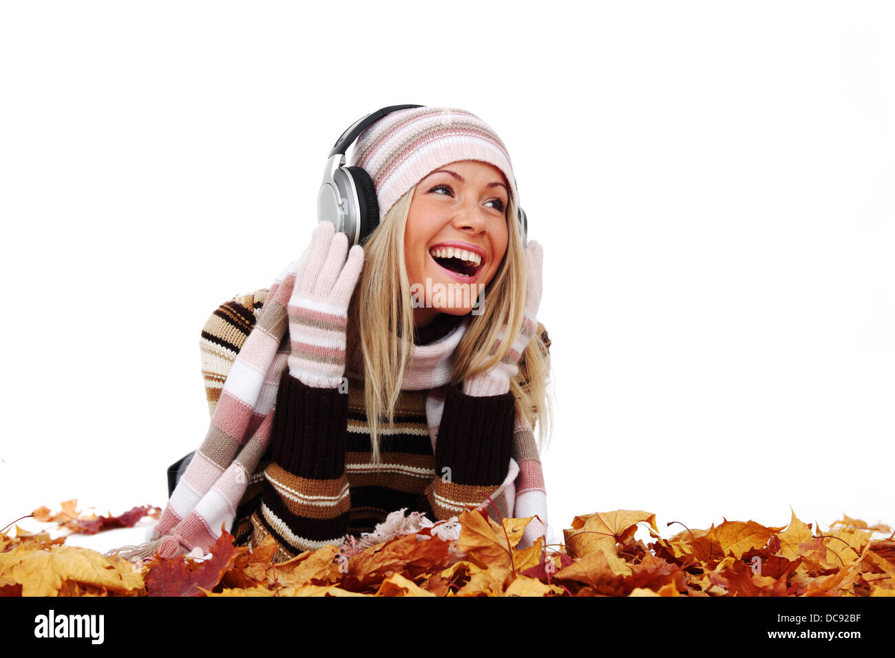 autumn woman listening music in studio Stock Photo - Alamy