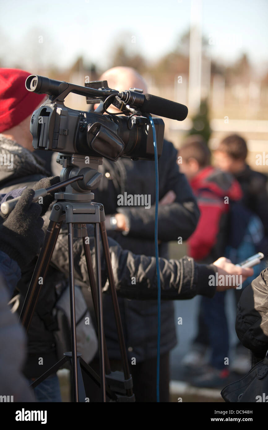 capturing event with professional video camera Stock Photo - Alamy