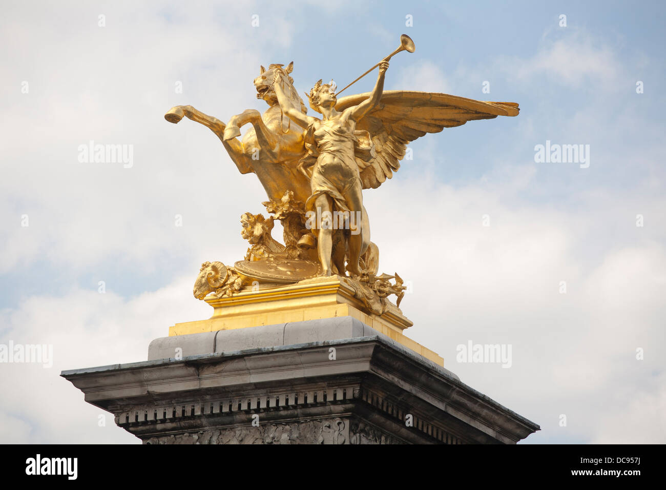 Golden statue in Paris Stock Photo - Alamy