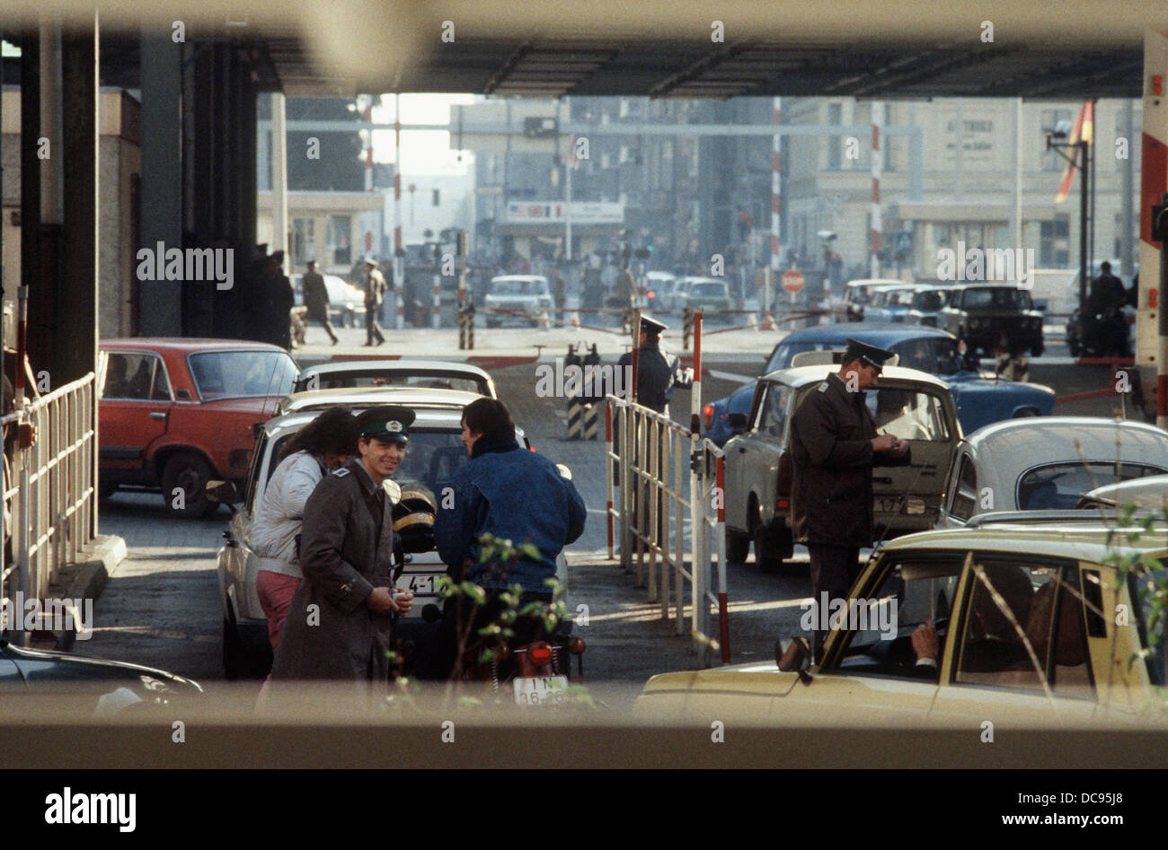 Cars cross the border from East to West Berlin one day ofter the ...