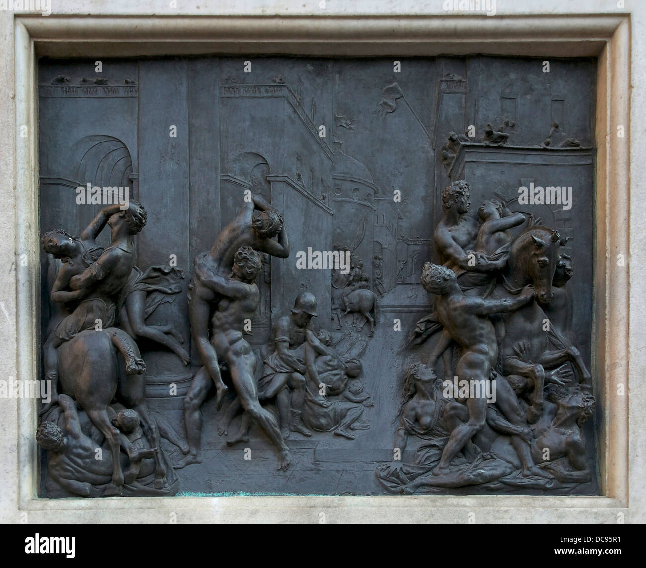 The rape of the Sabine women, by Giambologna. Bronze plaque on the ...