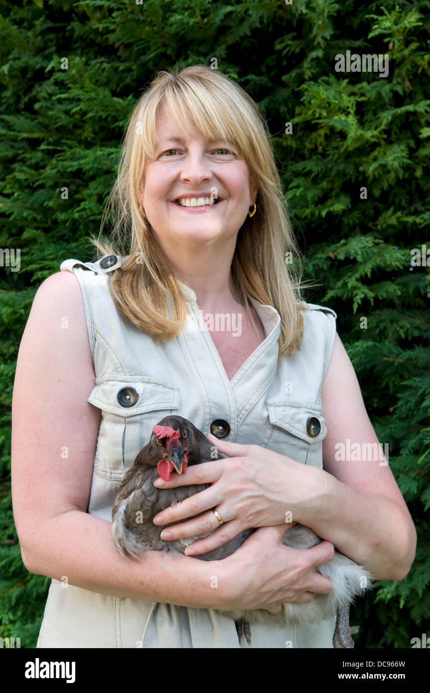 Smiling middle aged woman garden hi-res stock photography and images ...