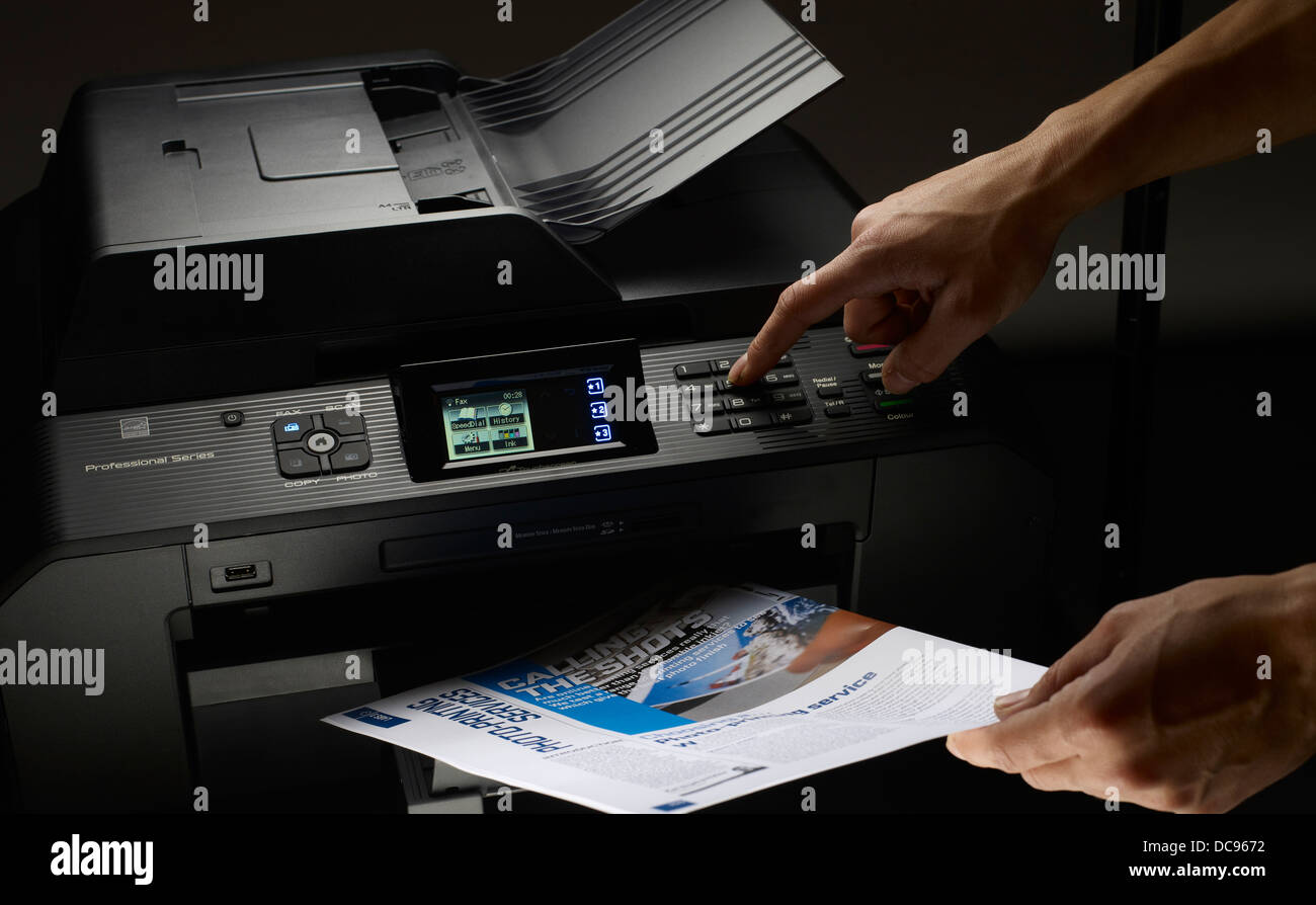 Using a printer or photocopier or scanner Stock Photo - Alamy