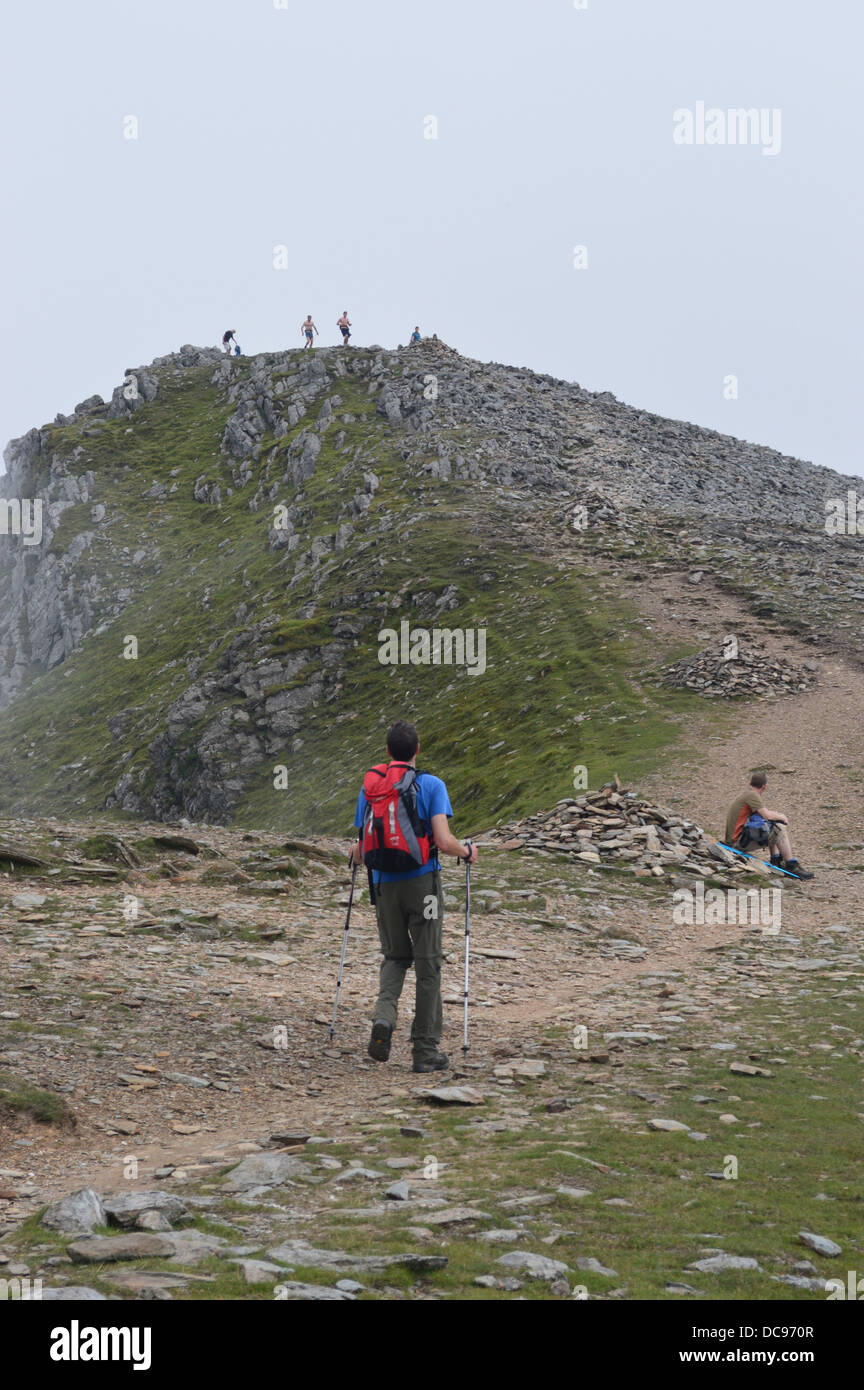 Walkers on top & just below the Summit of The Welsh Mountain Y Garn in ...