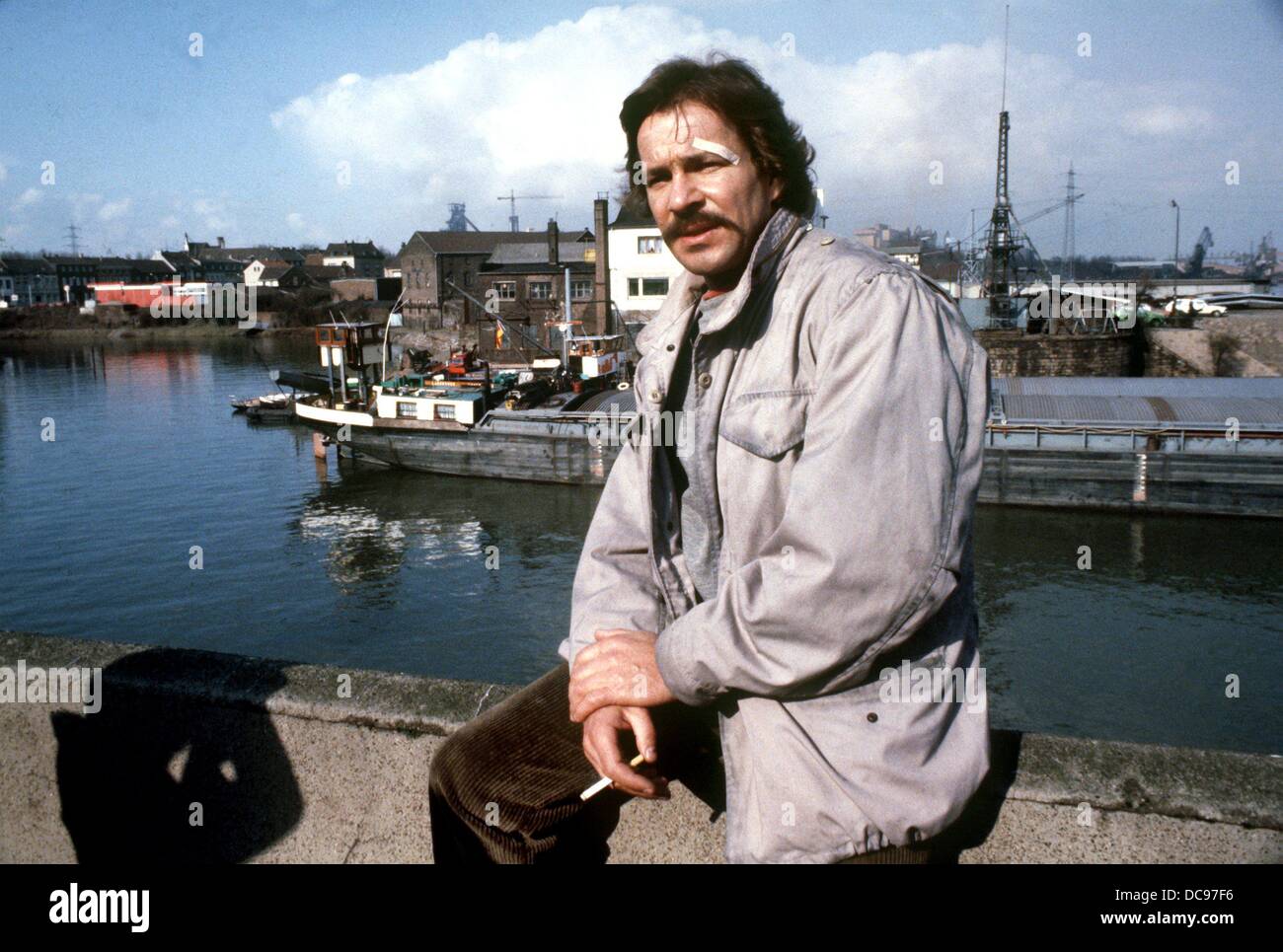 German actor Götz George poses at the quay wall of Duisburg harbour ...