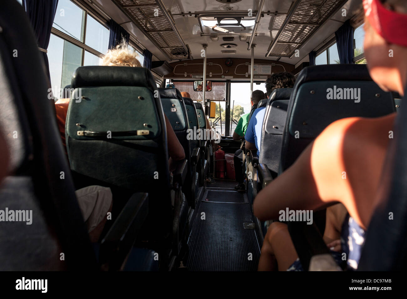 People on a bus on the island of Paros, Greece. August 2013 Stock Photo ...