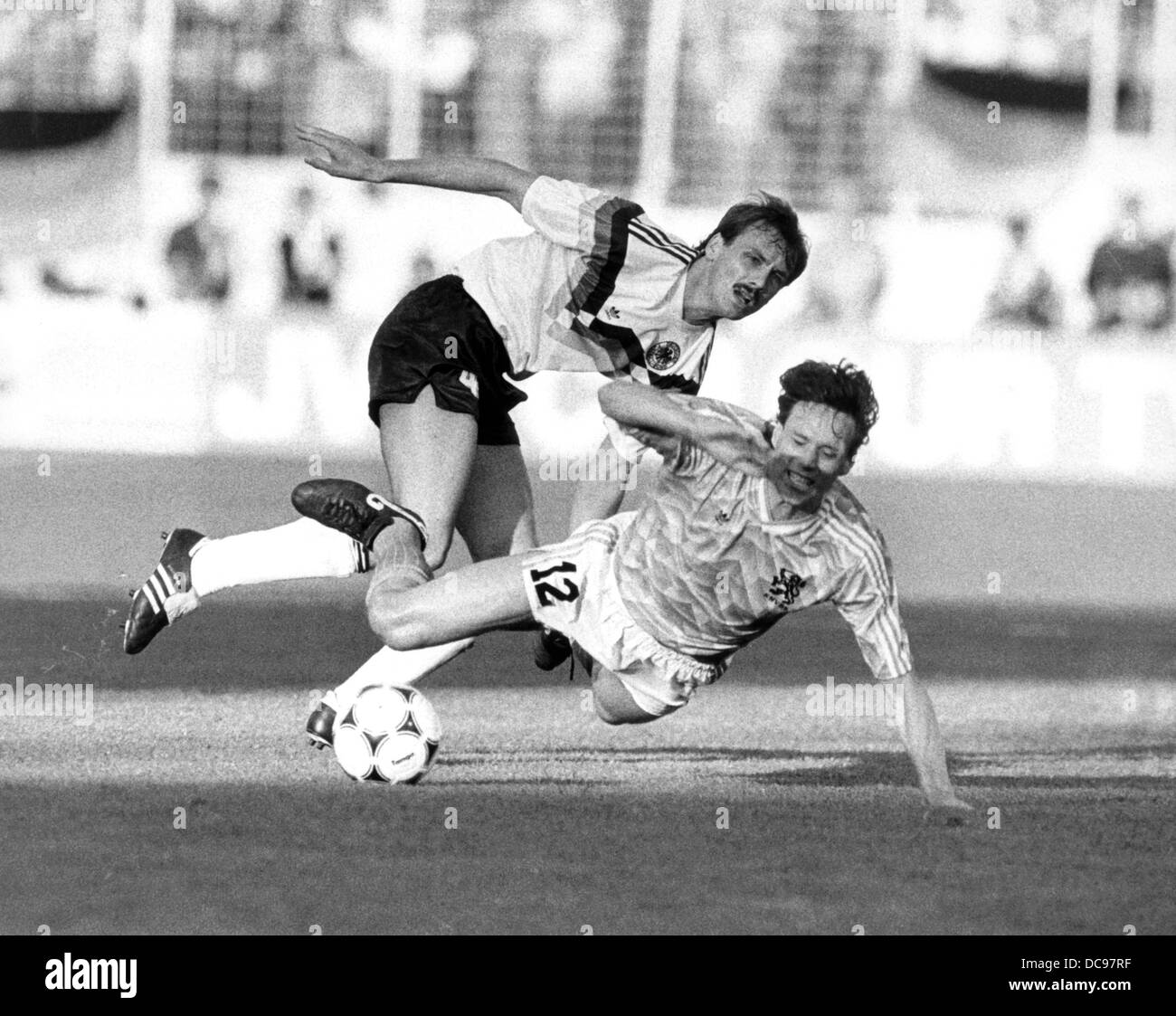 German defence player Jürgen Kohler against Dutch striker Marco van ...