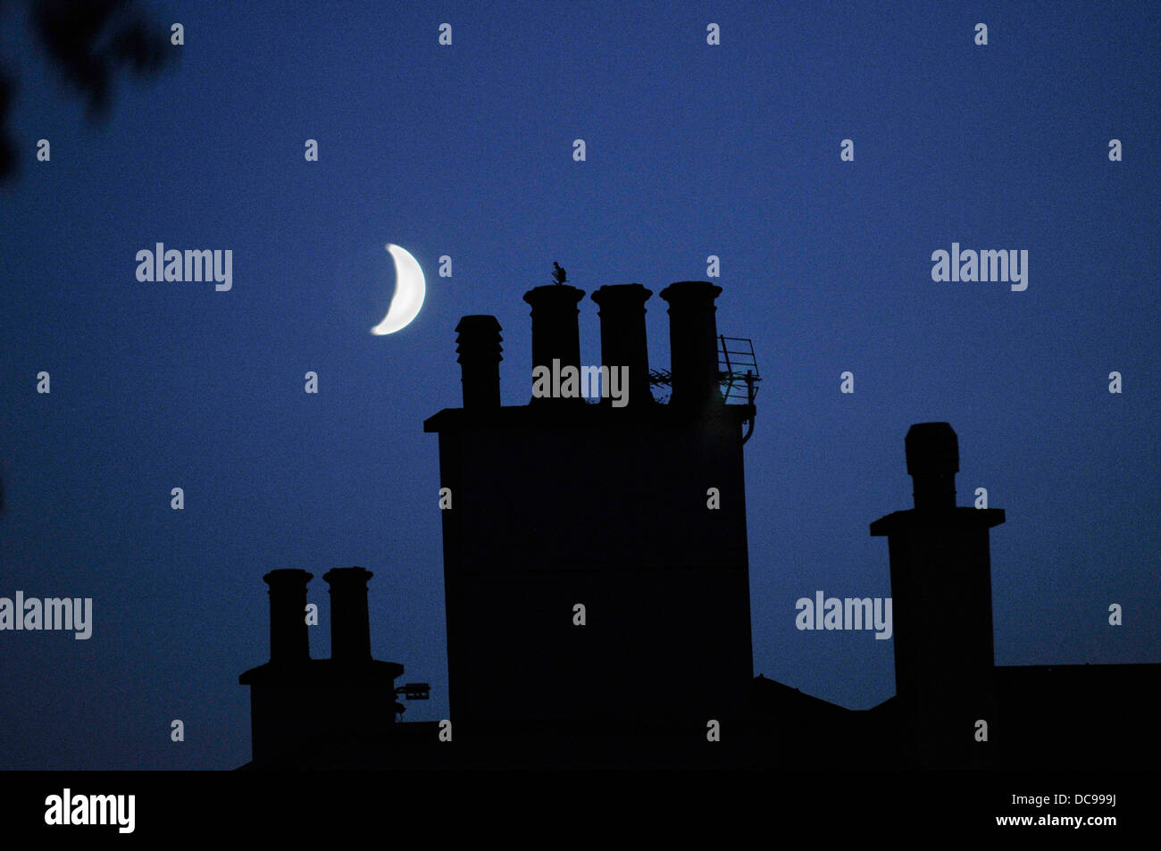 Moon and chimney pots UK Stock Photo - Alamy