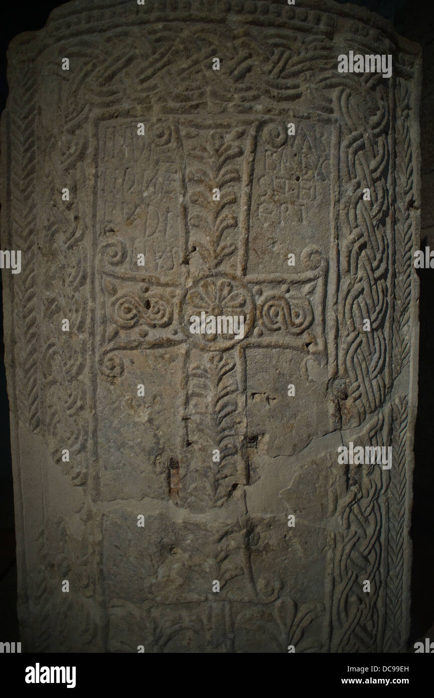 Cross on stone in the Romainmôtier Priory Stock Photo - Alamy
