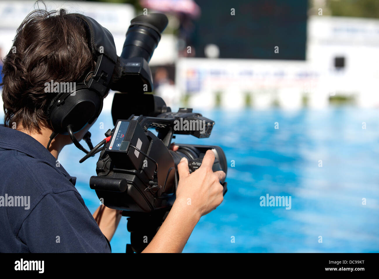 capturing event with professional video camera Stock Photo - Alamy