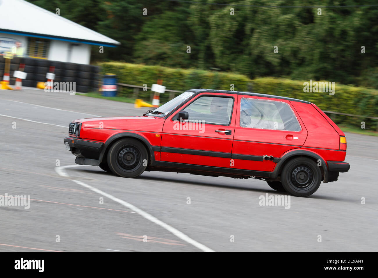 A car taking part in an AutoSolo at Castle Combe Circuit Stock Photo ...