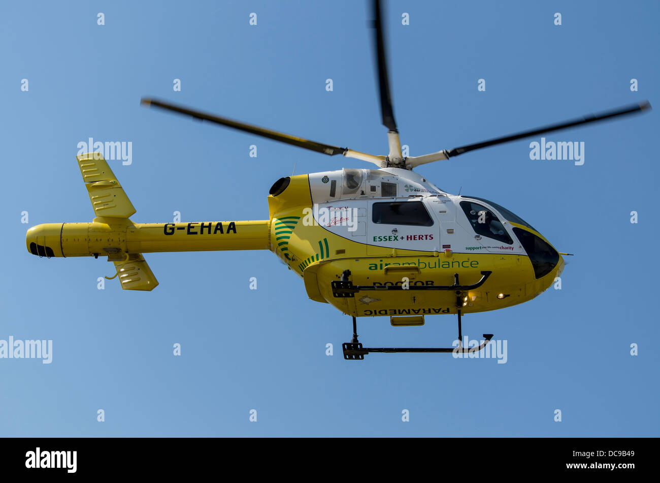 A air ambulance flying overhead England UK Stock Photo - Alamy