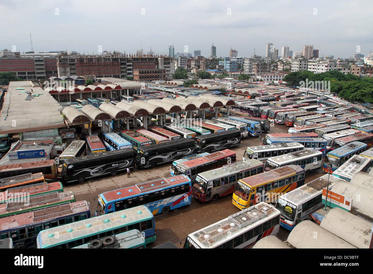 Dhaka, Bangladesh. 13th Aug, 2013. Buses are parked at an inter ...