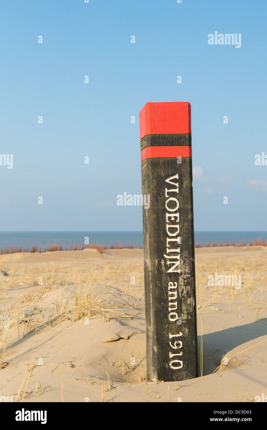 High tide pole on Dutch wadden island Texel Stock Photo - Alamy