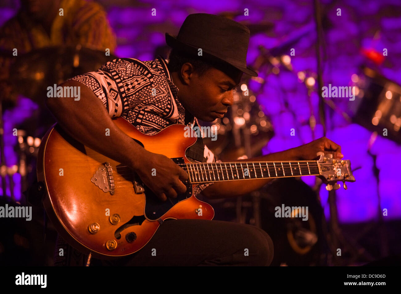 Jazz musician guitarist with Courtney Pine band on stage at Brecon Jazz ...