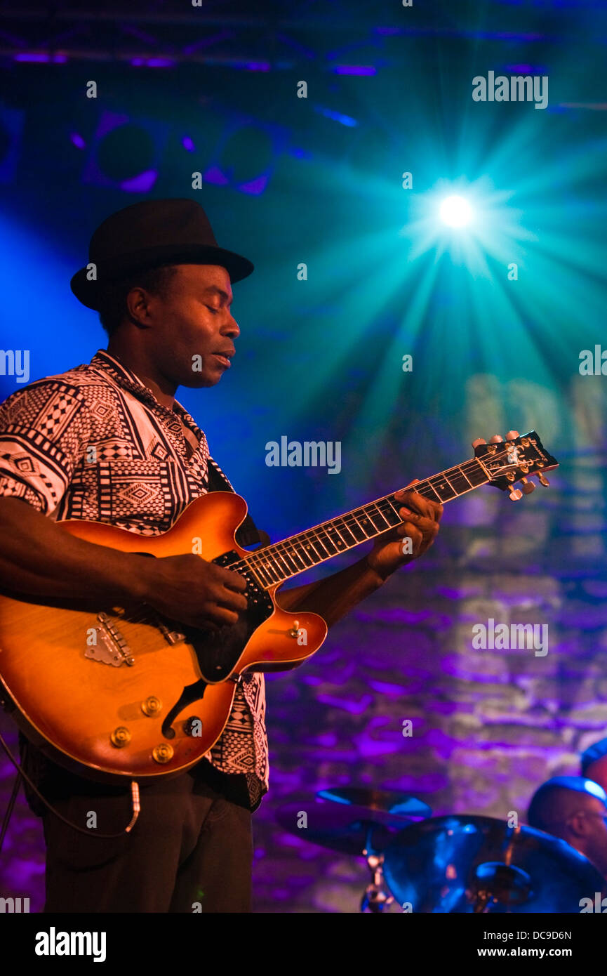 Jazz musician guitarist with Courtney Pine band on stage at Brecon Jazz ...