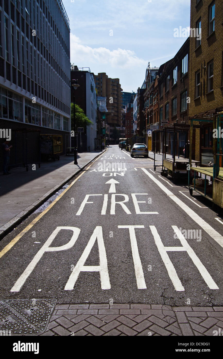 Fire path no entry road markings on Leather lane in London Stock Photo ...