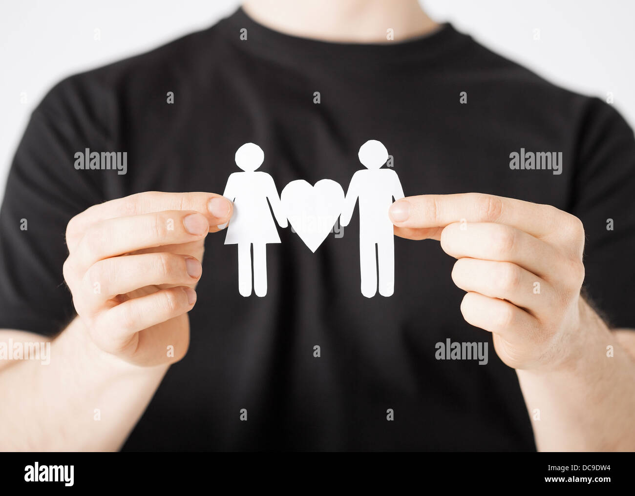 man hands with paper men Stock Photo - Alamy